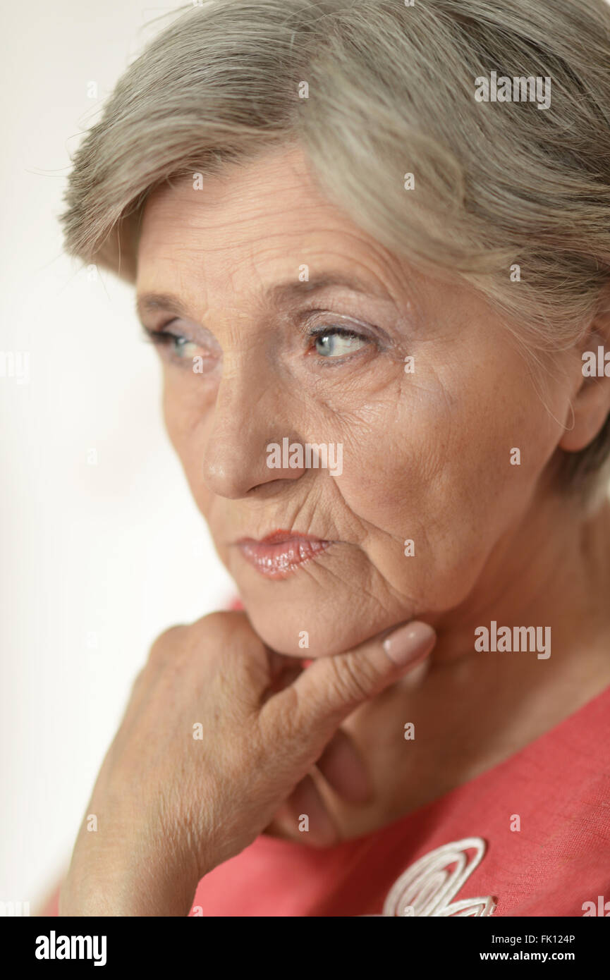 Sad senior woman Stock Photo - Alamy