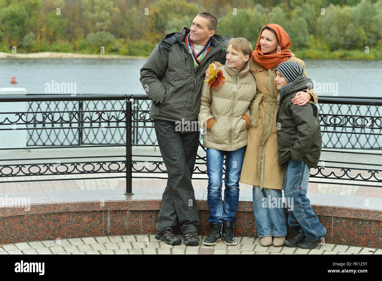 Portrait of family relaxing Stock Photo - Alamy