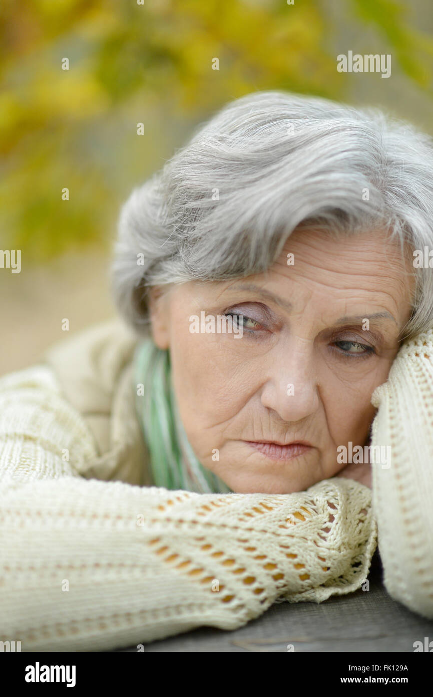 sad old woman Stock Photo - Alamy