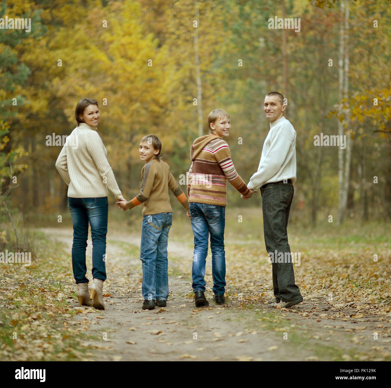Family of four Stock Photo - Alamy