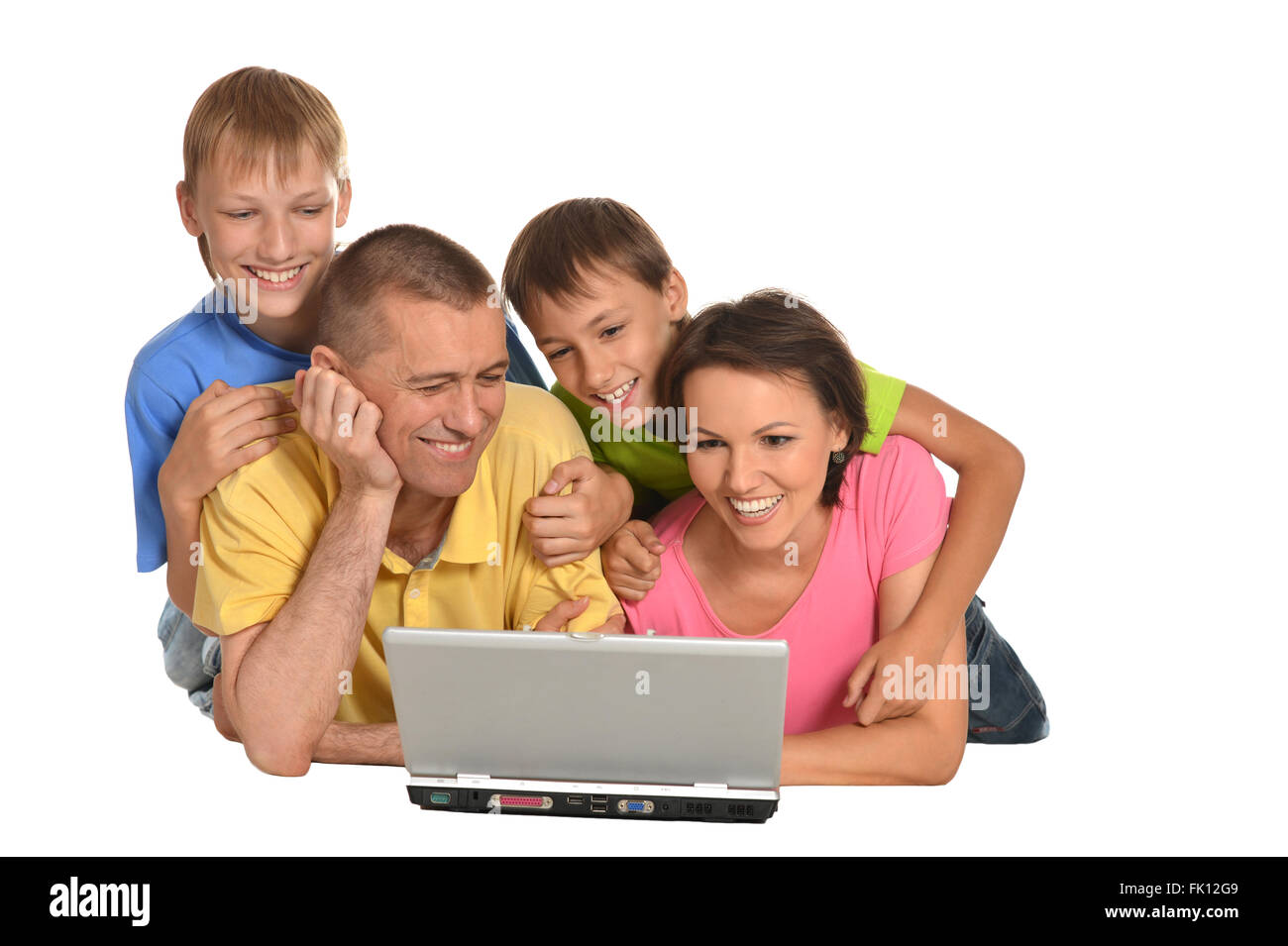 Happy family with laptop Stock Photo - Alamy