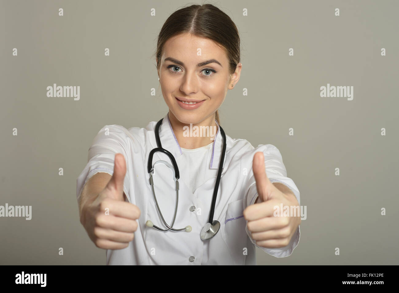 doctor with thumbs up Stock Photo - Alamy