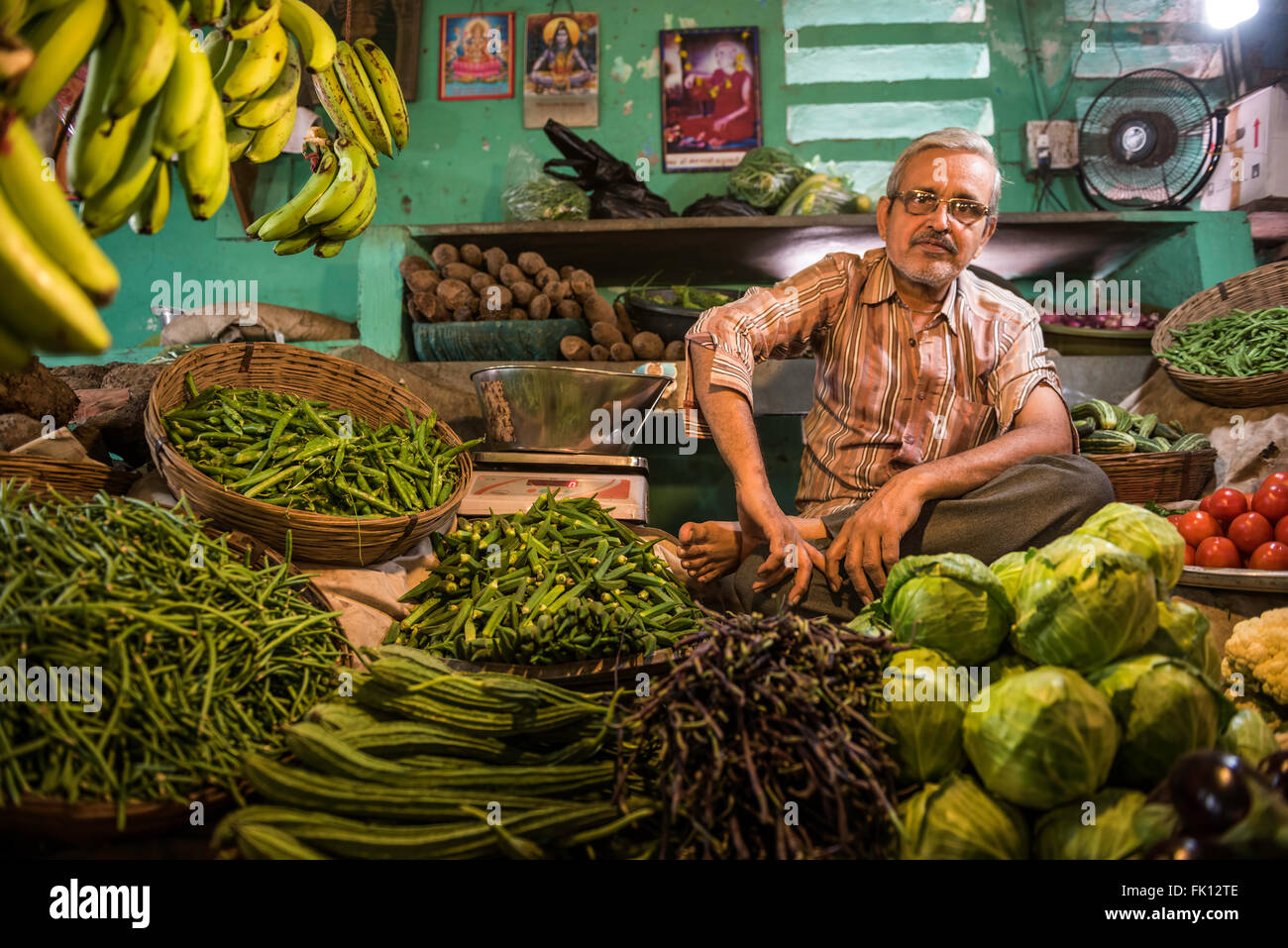 Vegetables seller in local maret Stock Photo - Alamy