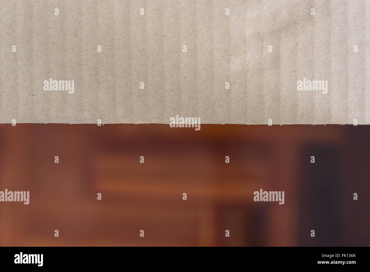 Cardboard paper with blur wooden background Stock Photo - Alamy