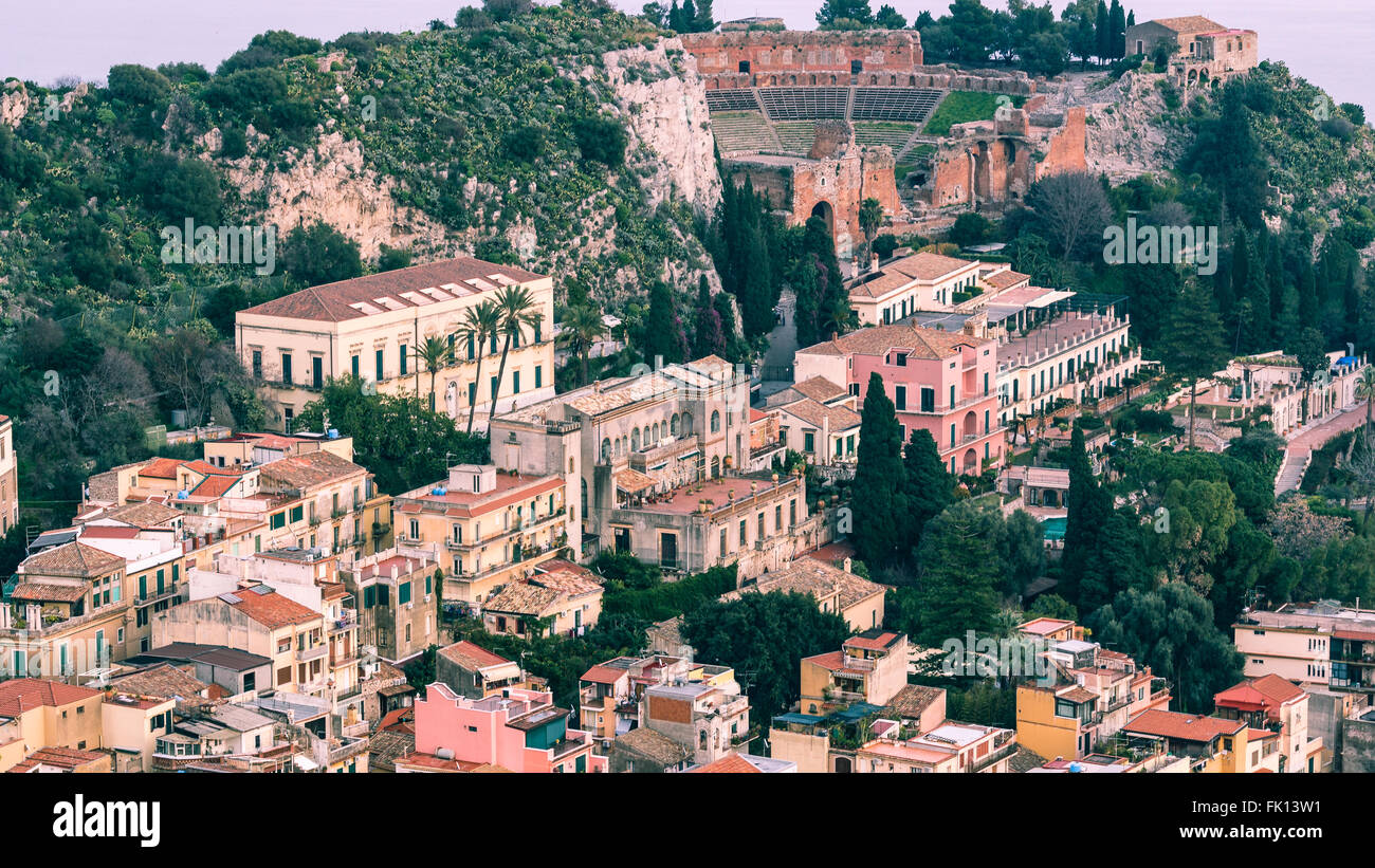 Aerial view of the Taormina city, with the ancient greek amphitheatre ...