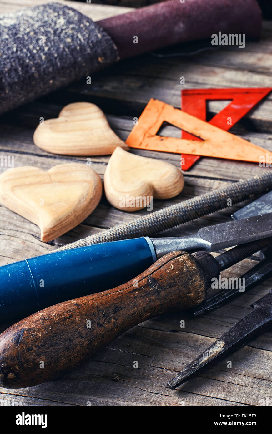 Symbolic wooden hearts cut by hand and carpenter tools Stock Photo - Alamy