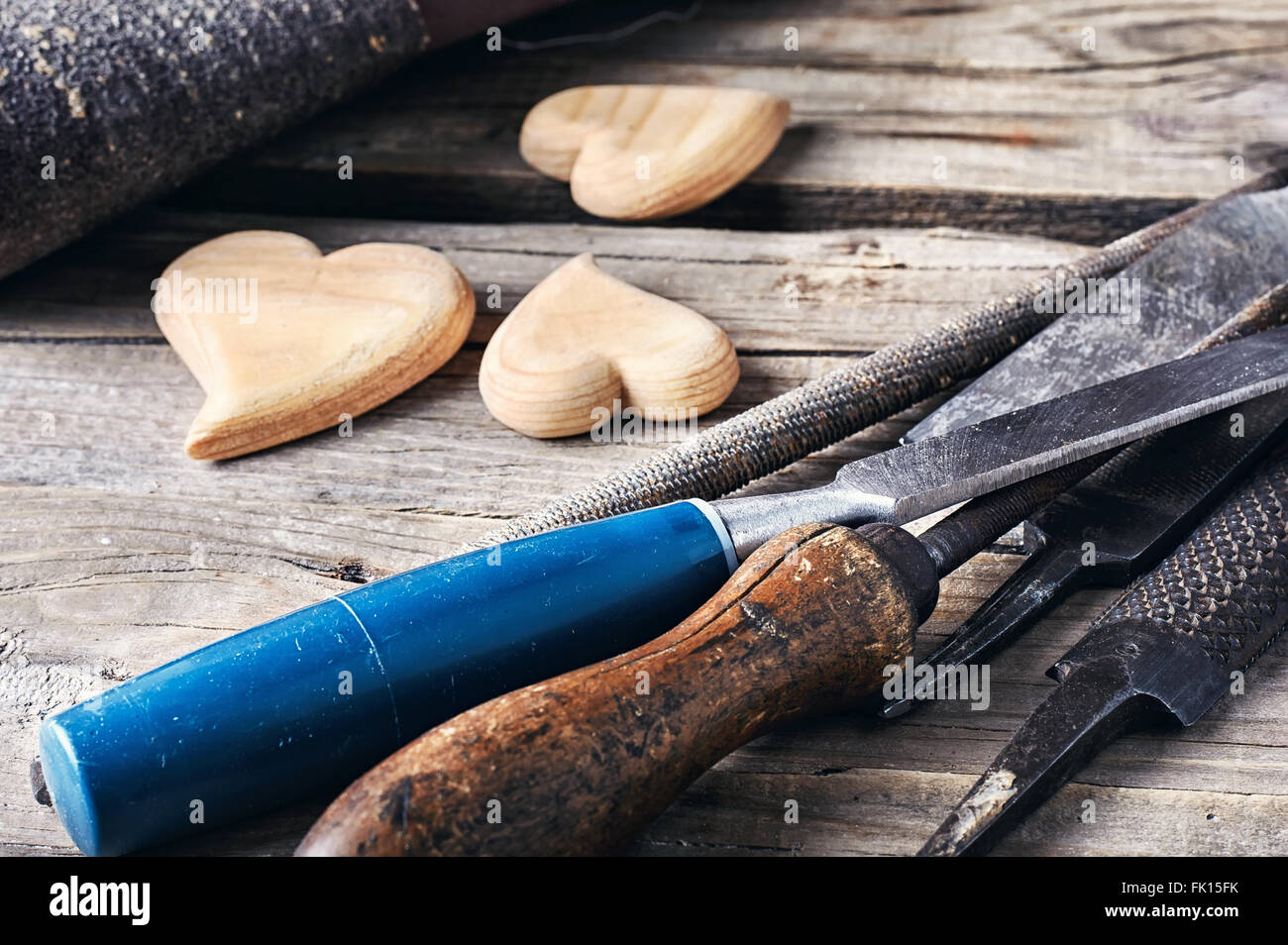 Symbolic wooden hearts cut by hand and carpenter tools Stock Photo - Alamy