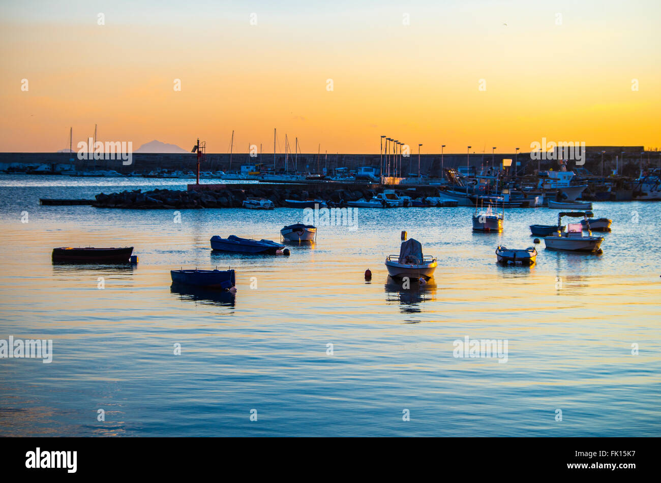 Fishing boats at night in Naples harbor Stock Photo - Alamy