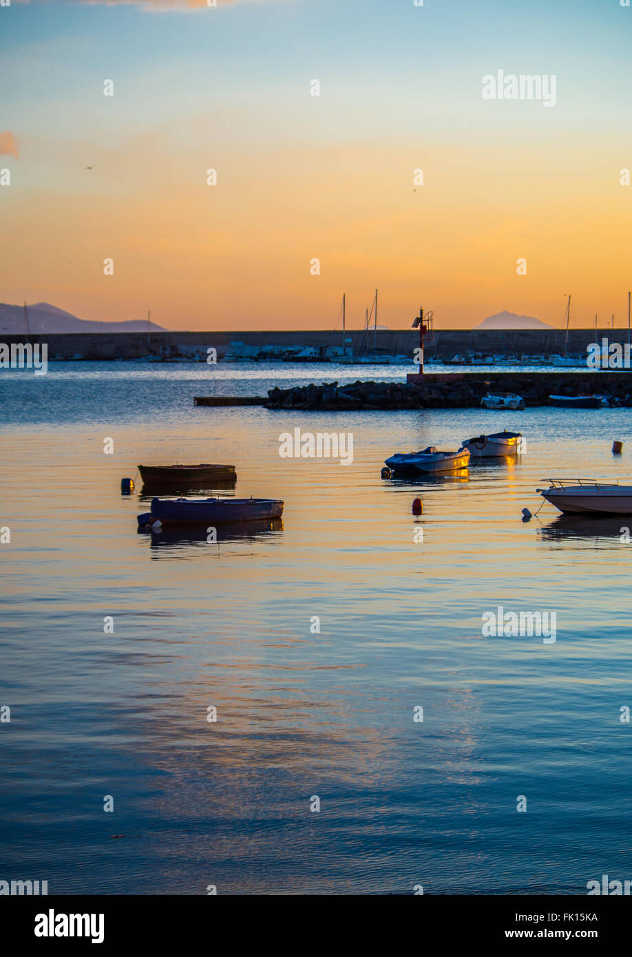Fishing boats at night in Naples harbor Stock Photo - Alamy