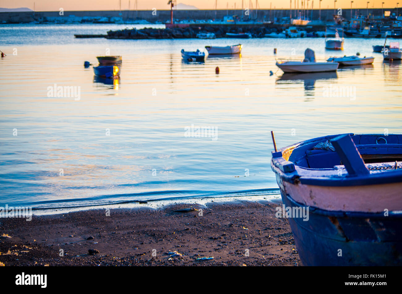 Fishing boats at night in Naples harbor Stock Photo - Alamy