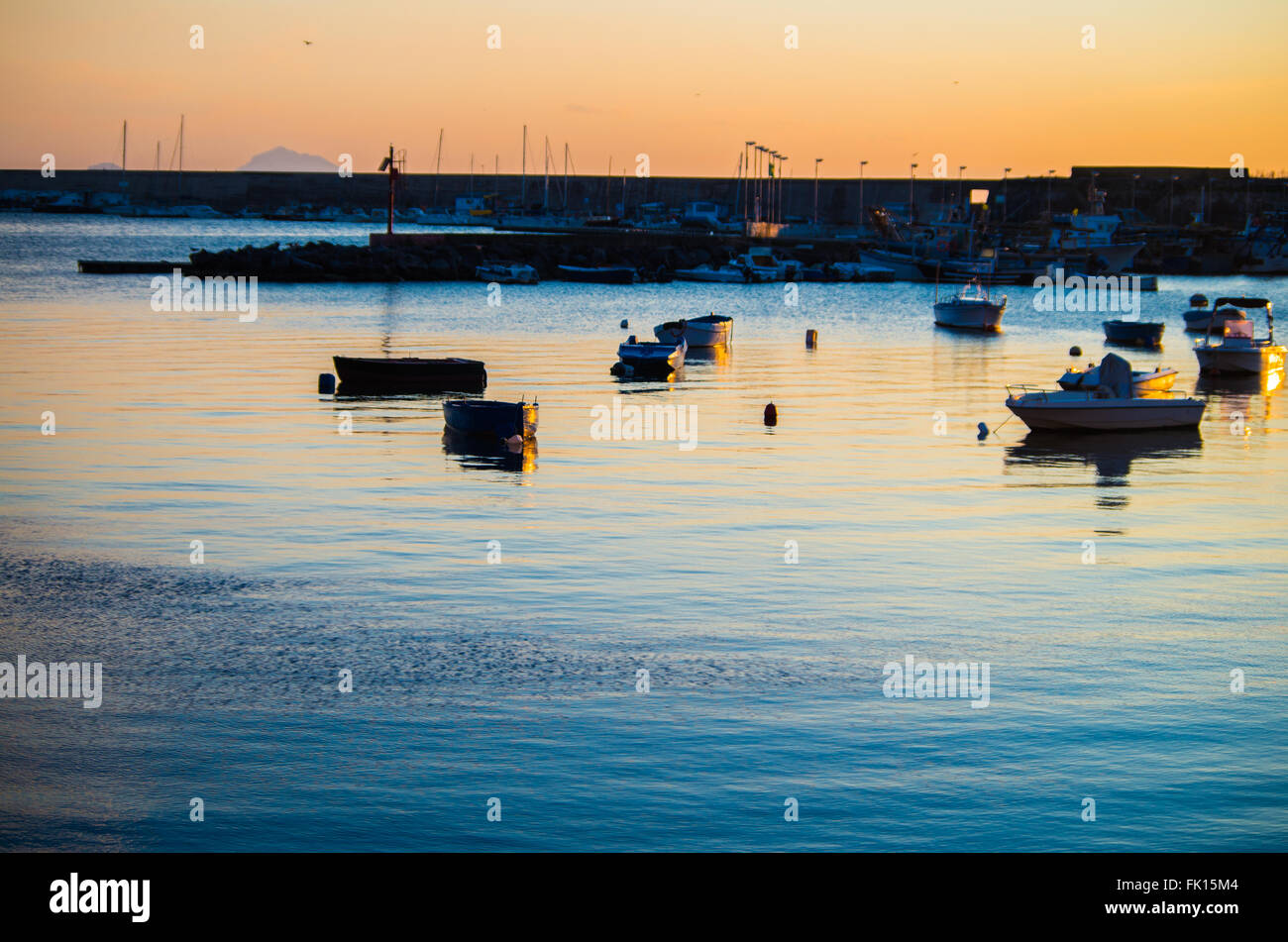 Fishing boats at night in Naples harbor Stock Photo - Alamy