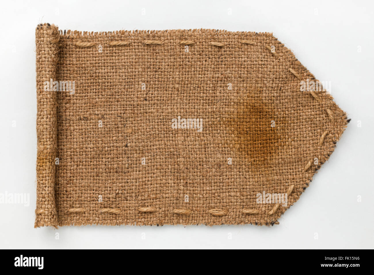 Arrow made from a burlap with wrapped edges on a white background Stock ...