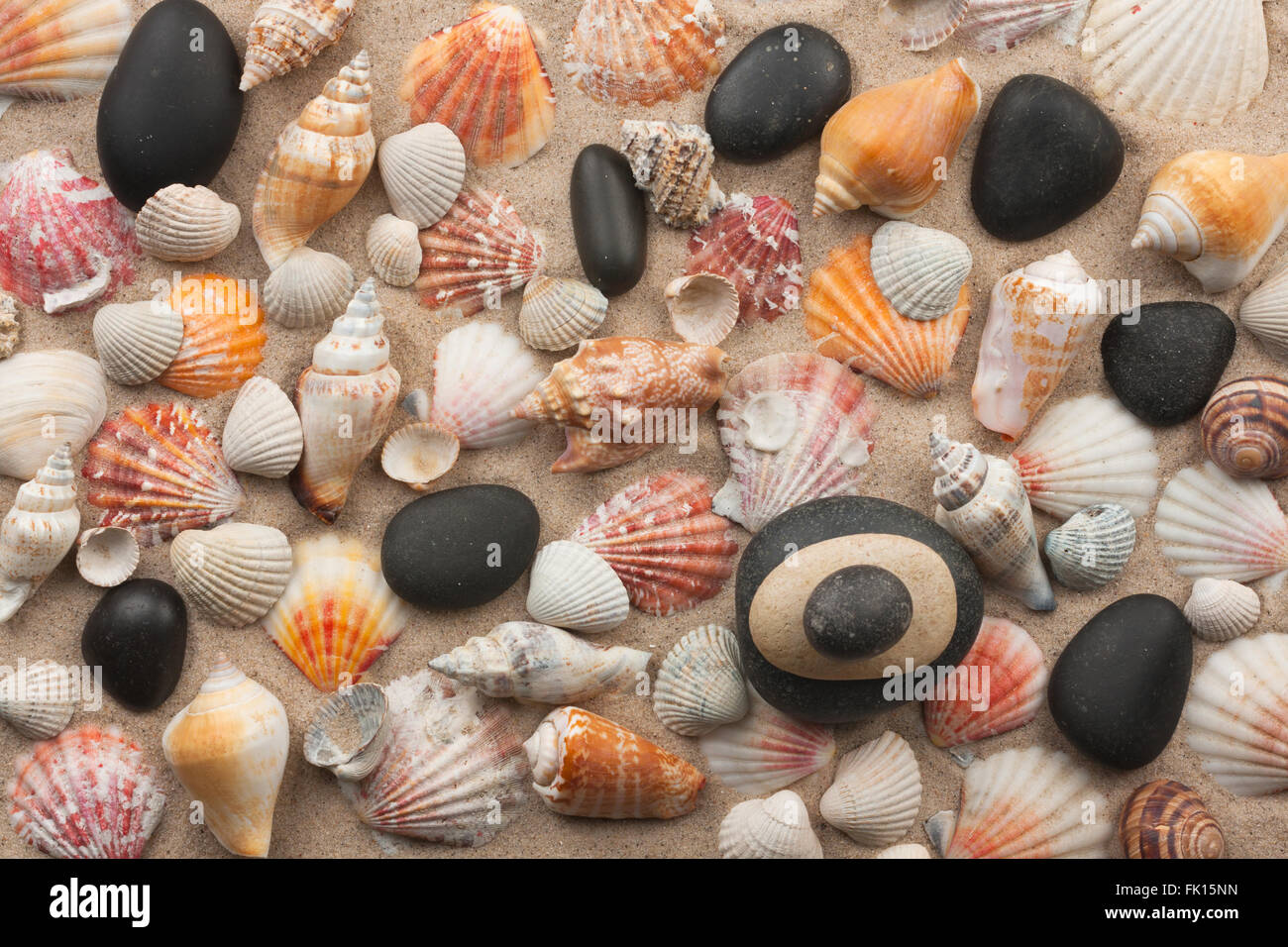 Pyramid stands on seashells and stones, as background Stock Photo - Alamy