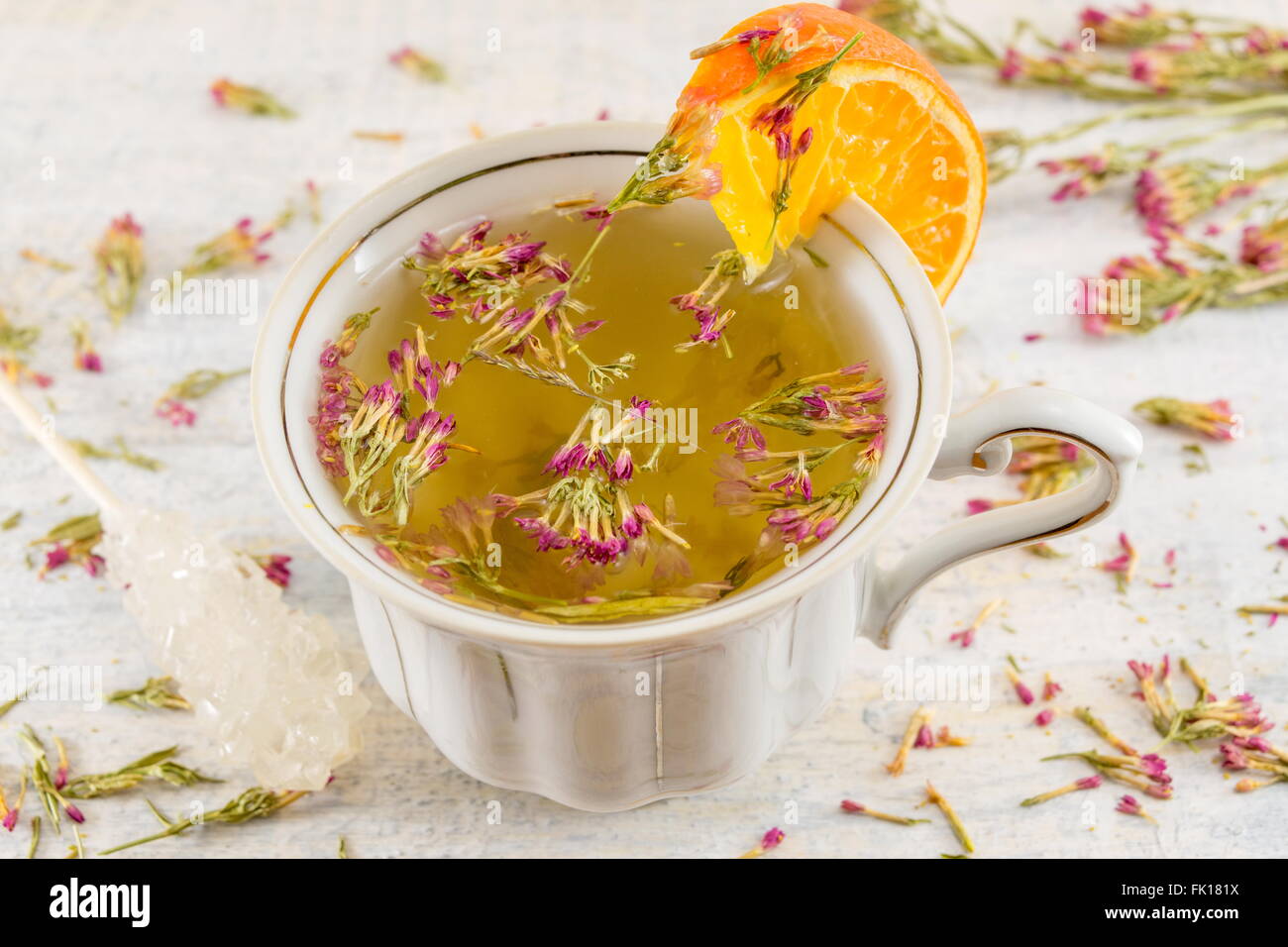 Hot bitter-grass tea in a teacup on a decorated table Stock Photo - Alamy