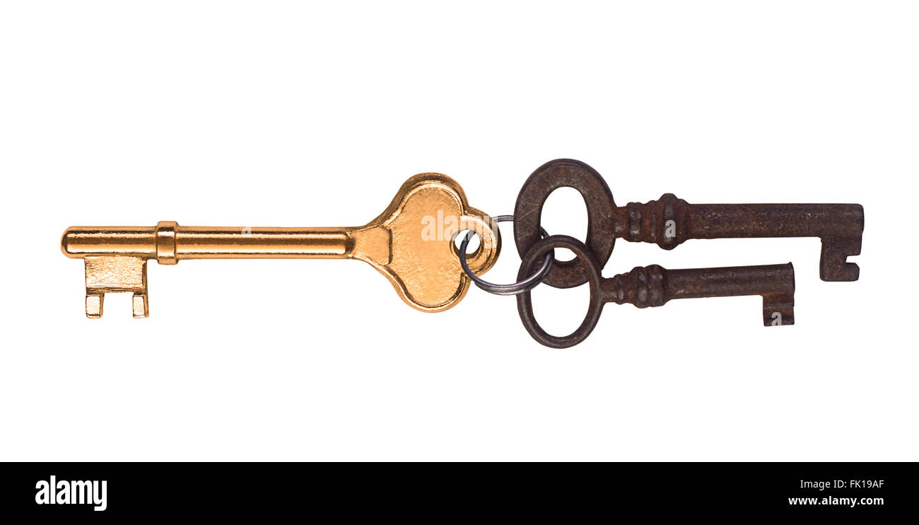 A golden key and two rusted ones Stock Photo - Alamy