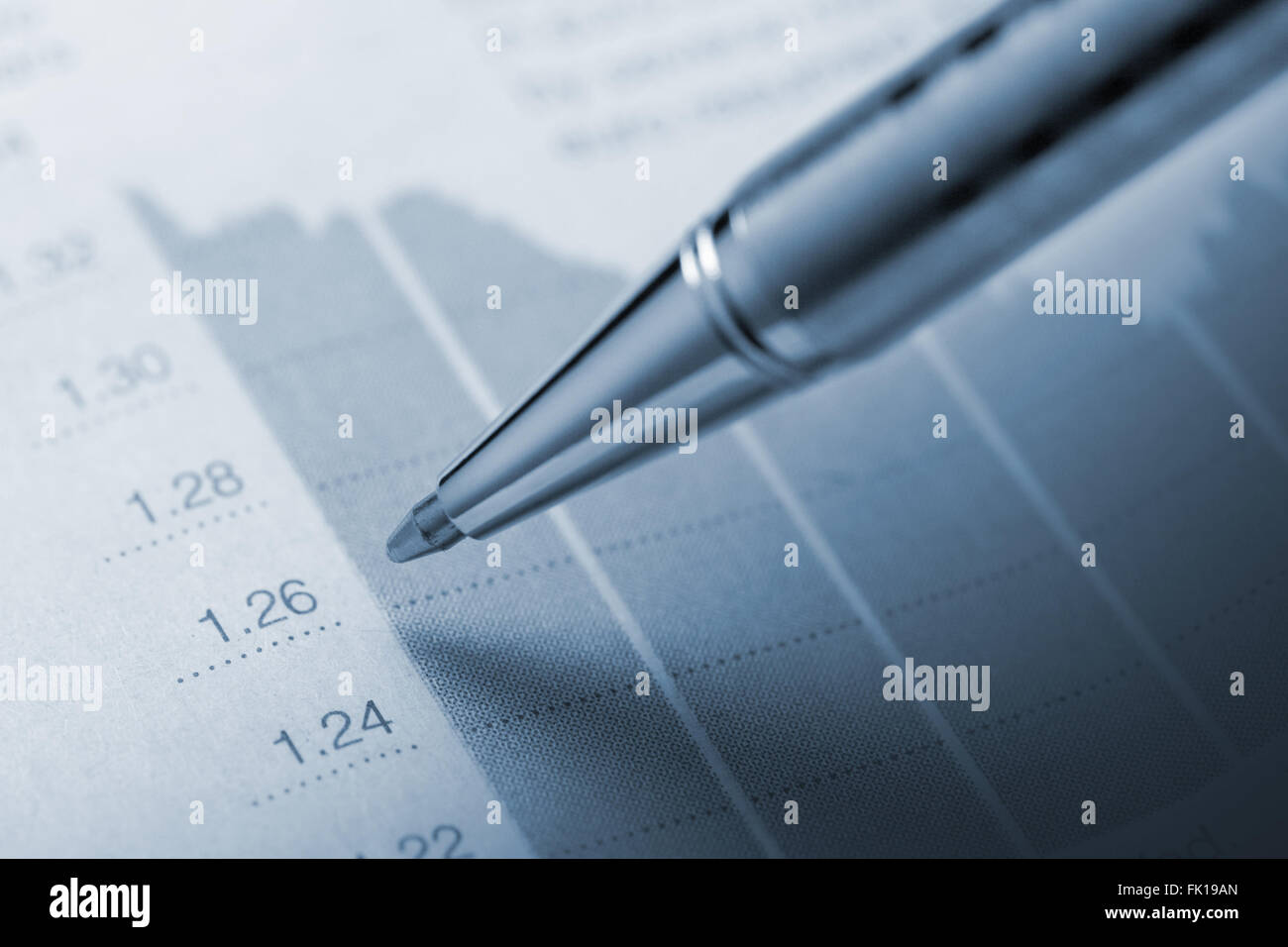 Horizontal top view of a pencil above a graphic printed on paper Stock ...