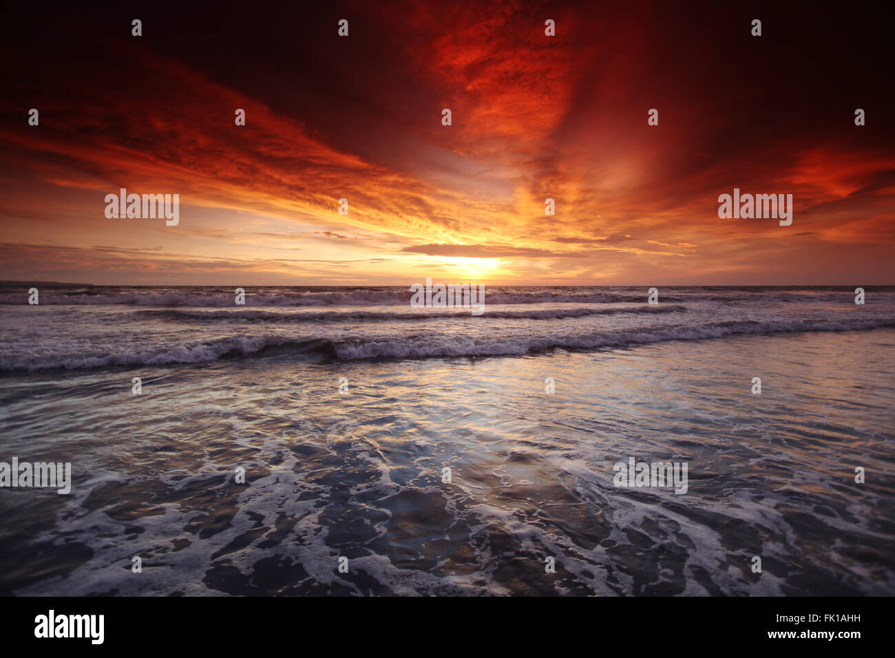 Radiant sea beach sunset on Bali Stock Photo - Alamy