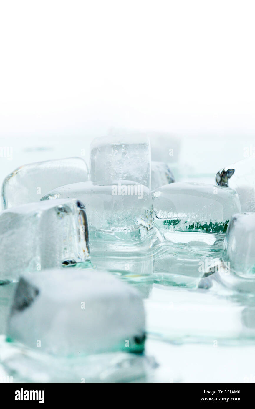 Fresh cool ice cubes macro close up isolated on white Stock Photo - Alamy