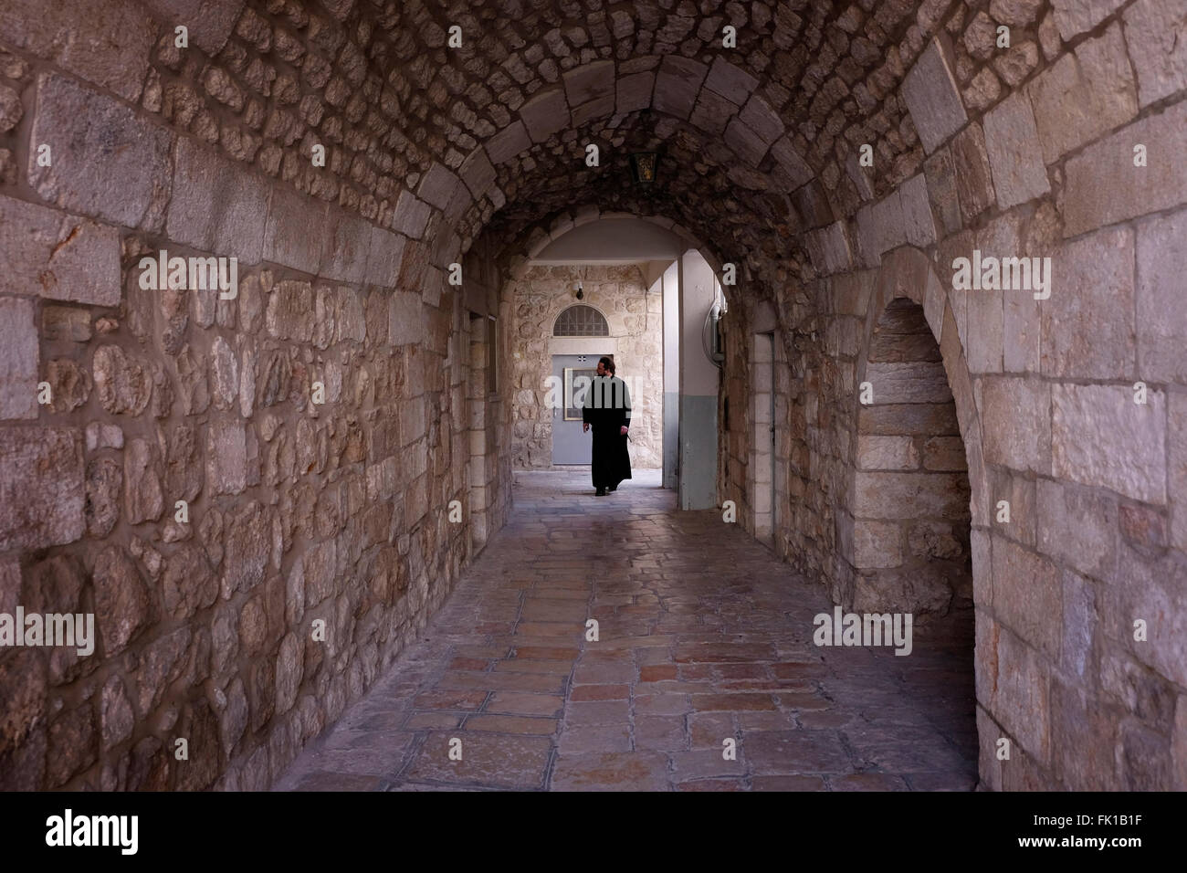 An orthodox priest walking at the Greek Orthodox Patriarch compound in ...