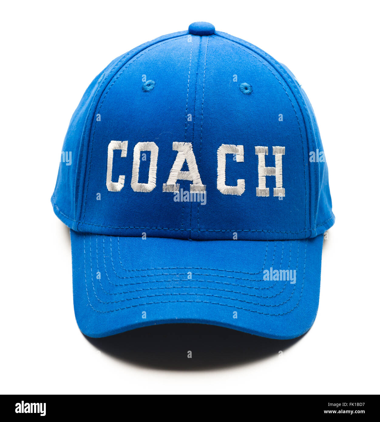Blue baseball cap with Coach written on it isolated on white background ...
