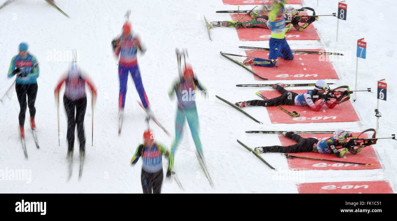 Competitors at the shooting range during a training session at the ...