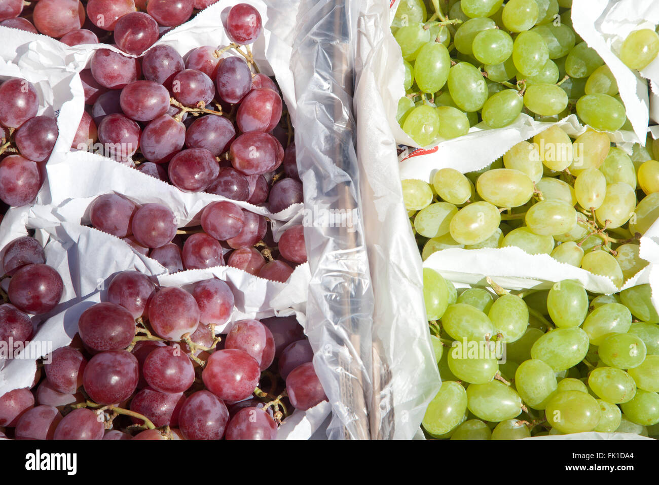 grapes of different color in the market Stock Photo - Alamy