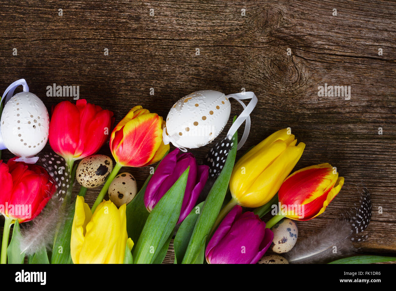 Spring flowers with easter eggs Stock Photo - Alamy