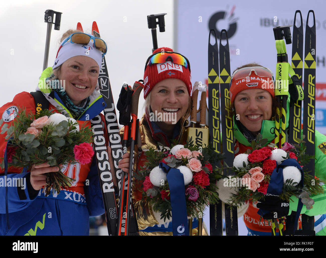 Gold medal winner Tiril Eckhoff of Norway (C) is flanked on the podium ...