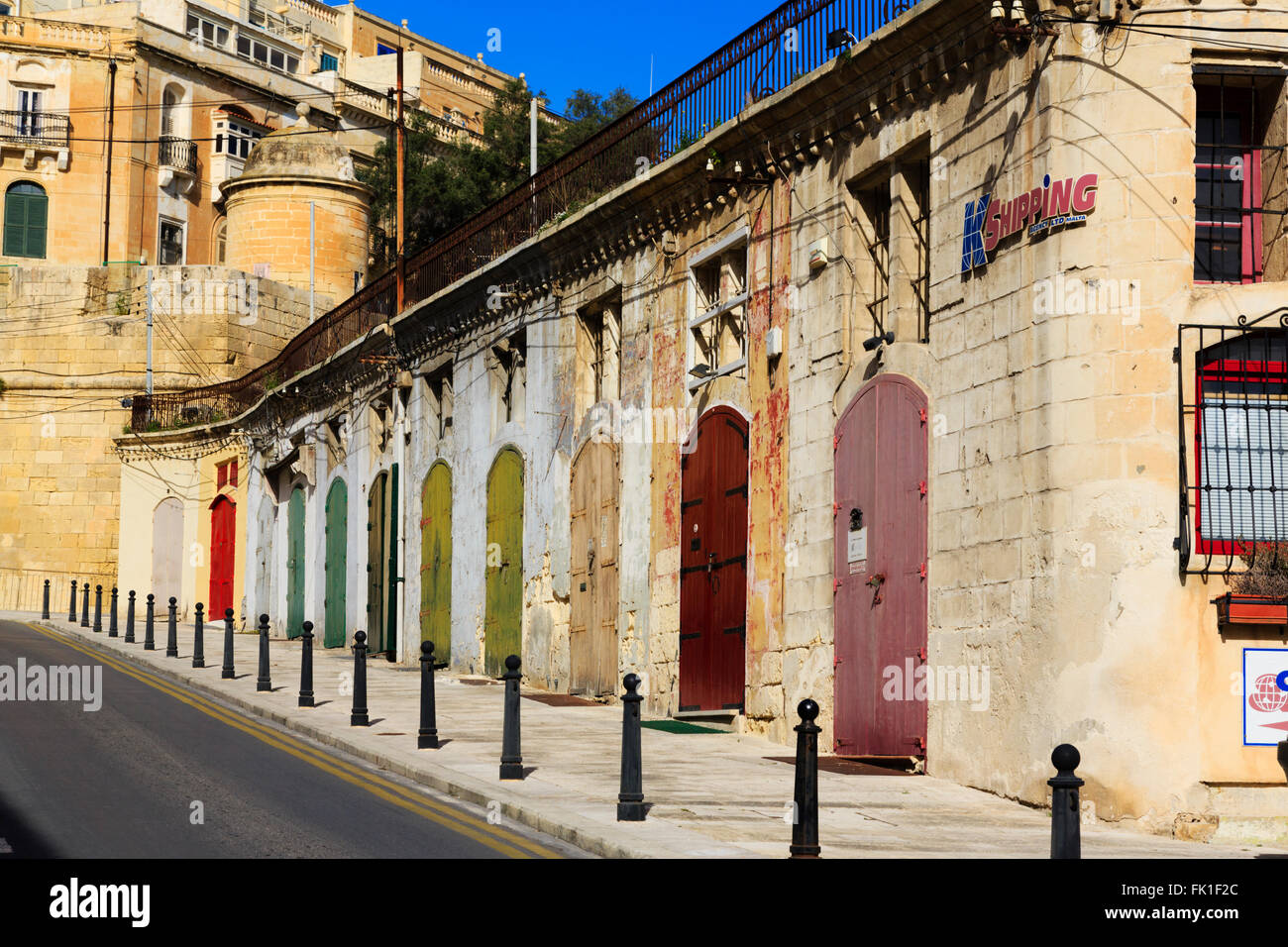 Colourful warehouse doors, Liesse St, leading to Victoria Gate ...
