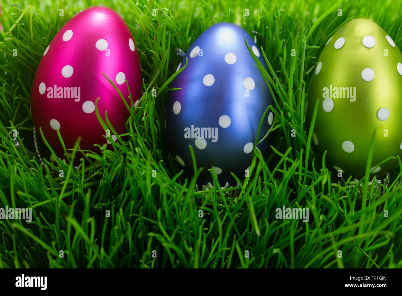 Easter eggs in grass Stock Photo - Alamy