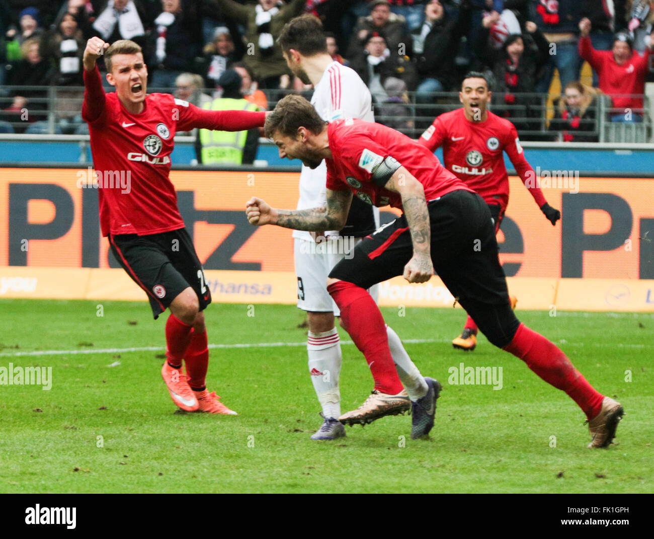 Frankfurt's Marco Russ (FRONT R) celebrates his 1-1 goal with Luca ...