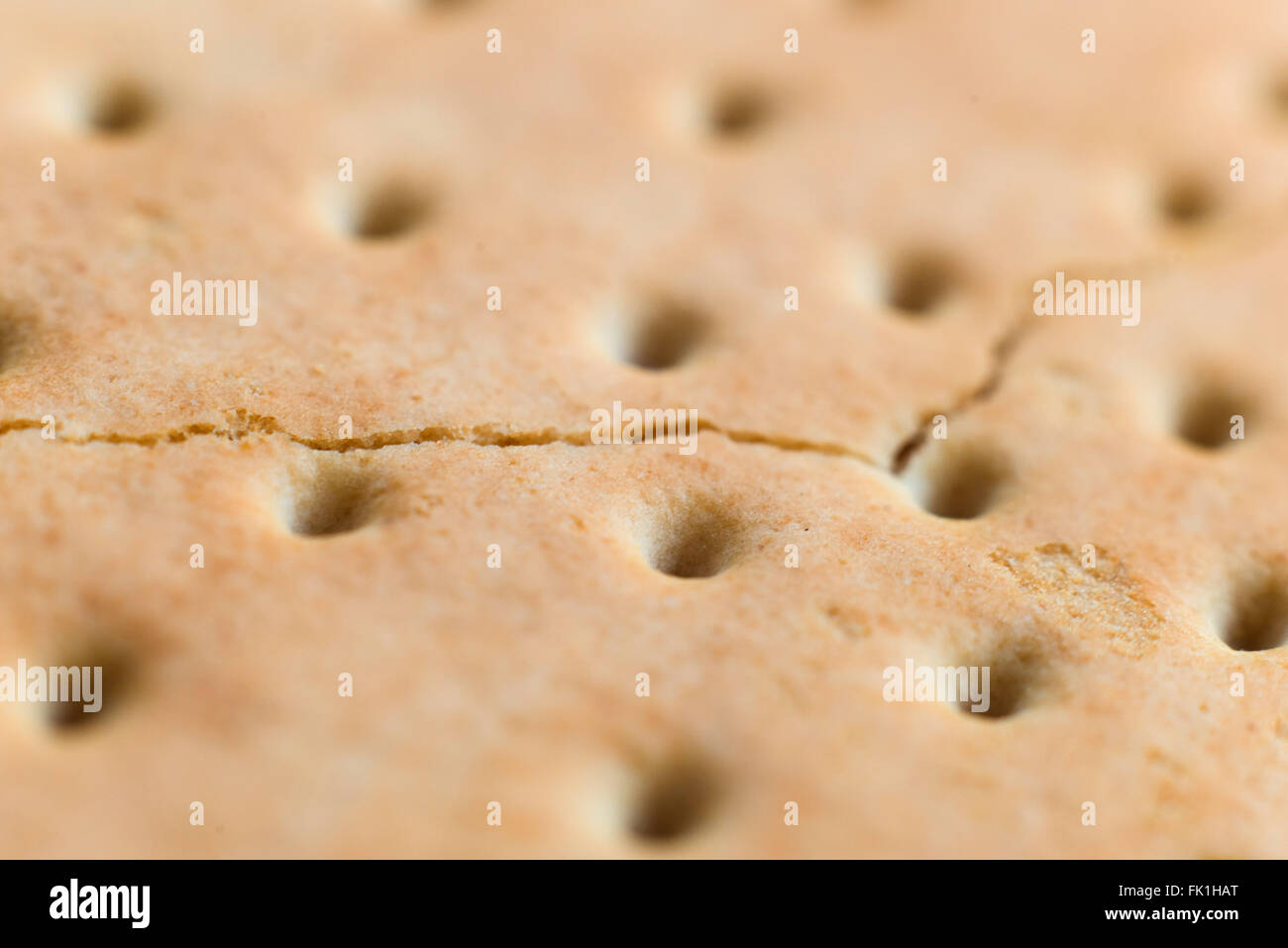 Close up of cracked biscuit Stock Photo - Alamy