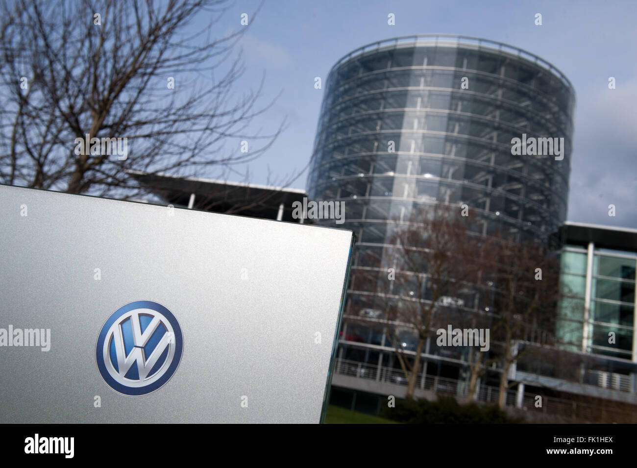 A VW logo seen on a sign in front of the Transparent Factory of German ...