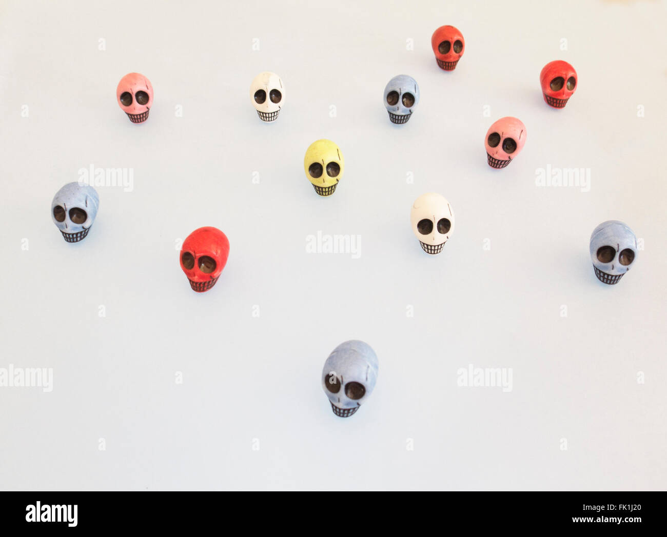 Background for Halloween with cute, colorful, funny skulls Stock Photo ...