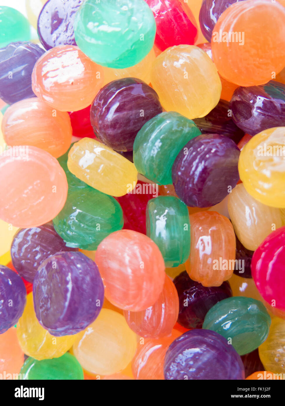 Celebratory children's backgrounds with colorful candies and sweets ...