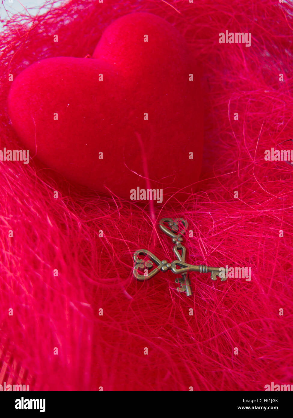 Background with red velvet hearts and keys for Valentines Stock Photo ...