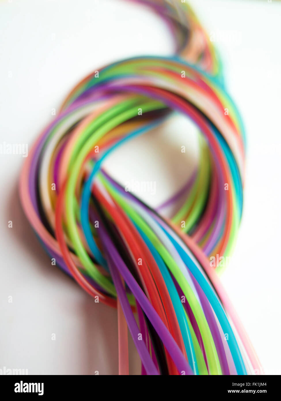 colored thread tied with a knot Stock Photo - Alamy