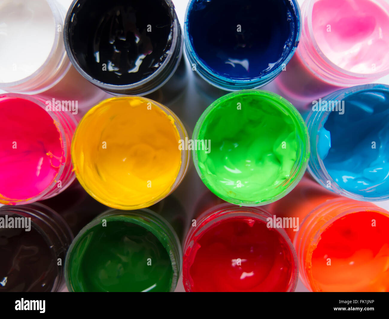 view milestone on open packages of multi-colored paint Stock Photo - Alamy