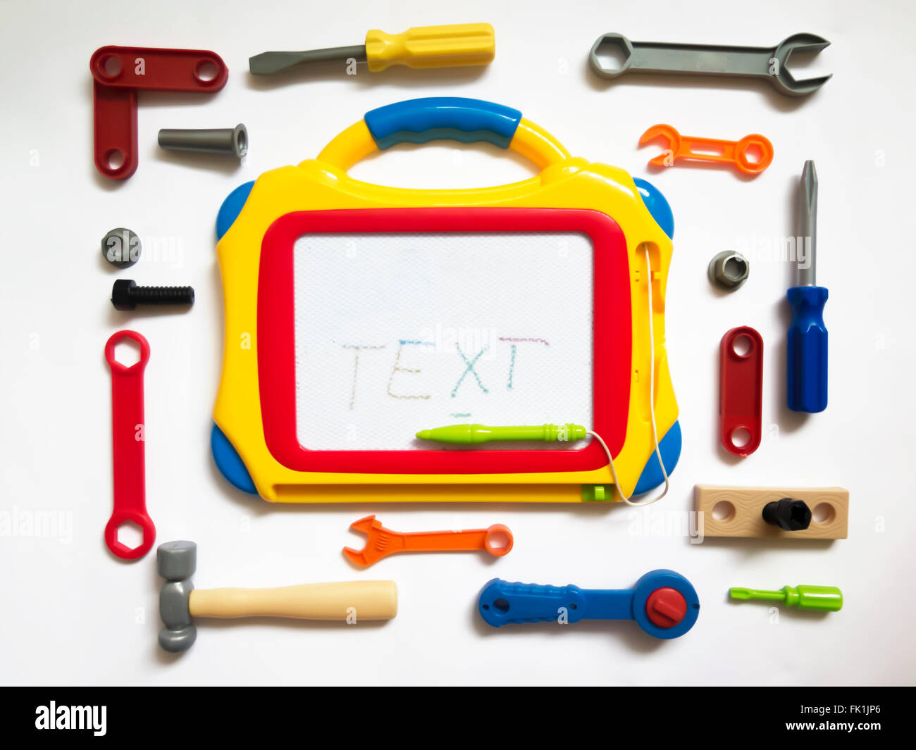 Background with toys, locksmith tools, Board letters, top view Stock ...