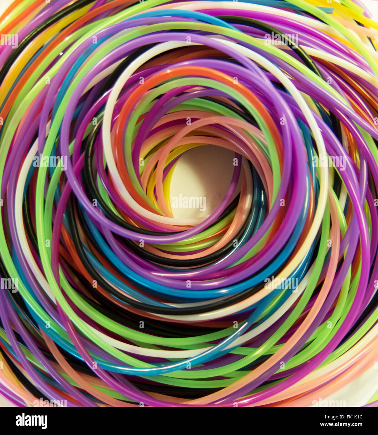 Background of twisted spiral colored lines Stock Photo - Alamy