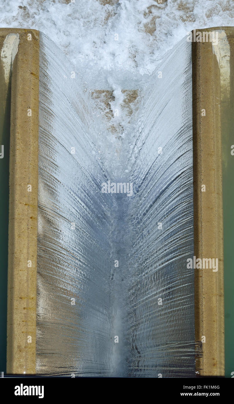 Artificial flume by water falling Stock Photo - Alamy