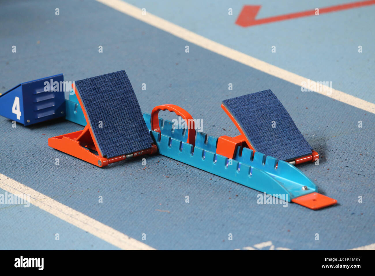 Blue and Orange Starting Blocks in Track and Field Stock Photo - Alamy