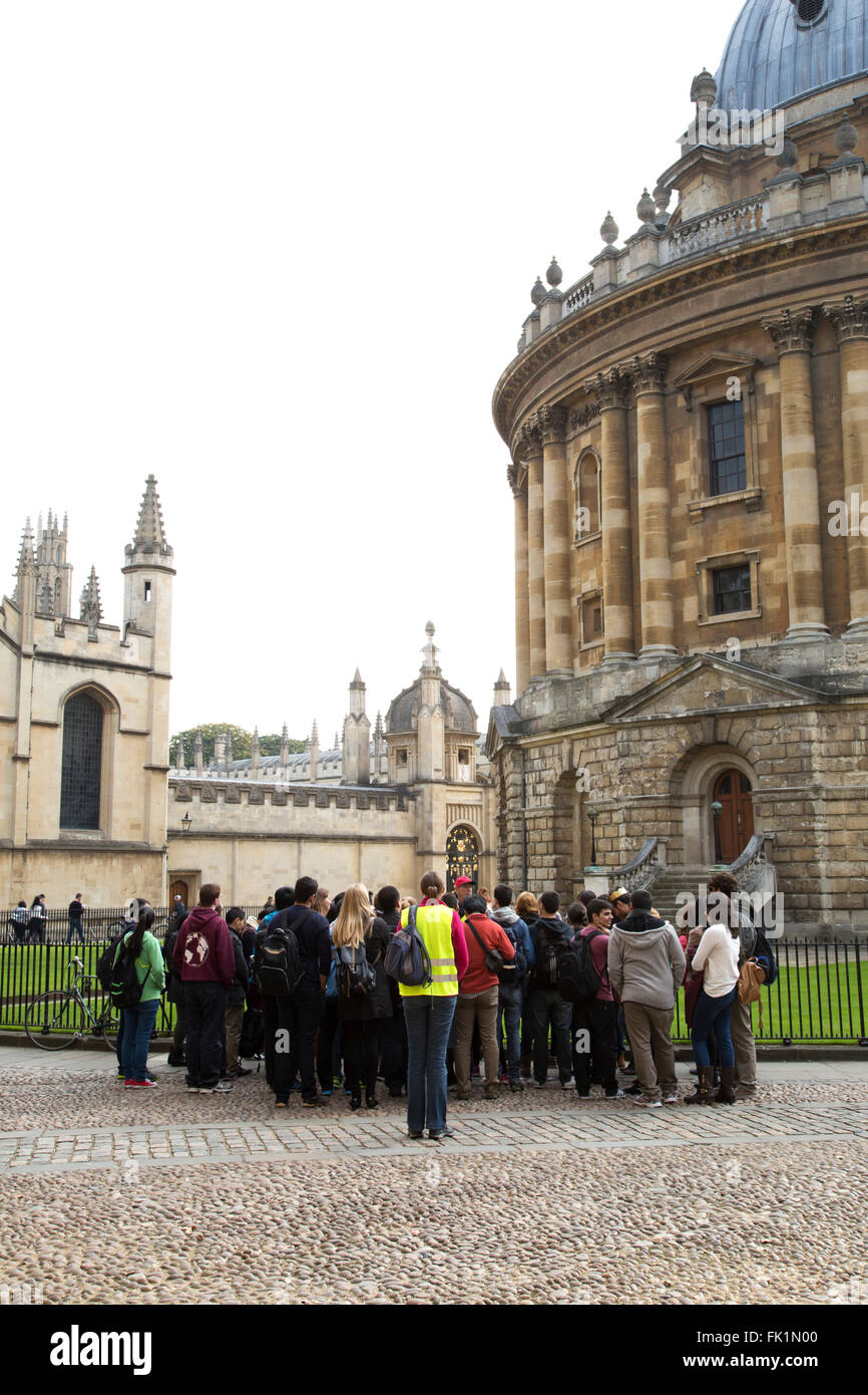 Tourists on a guided tour in the Radcliffe Square, Oxford Stock Photo ...