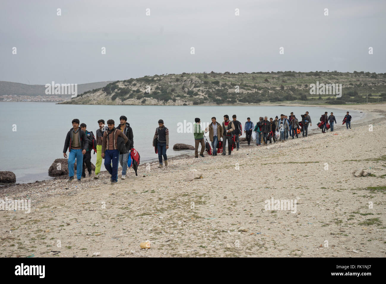 Refugees from Afghanistan on the way to be met by smugglers to take ...