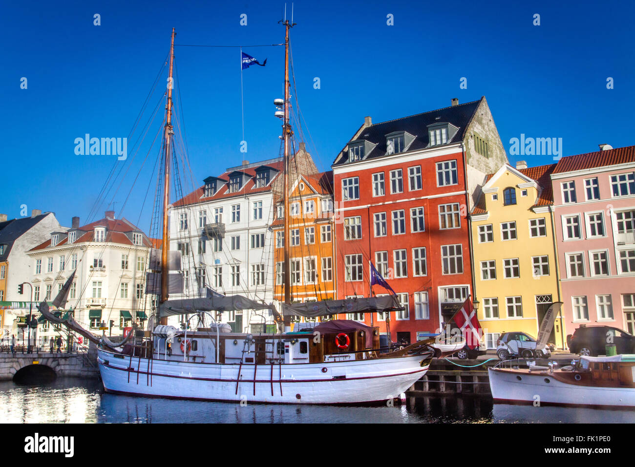 Nyhavn harbour, a popular tourist destination in Copenhagen, Denmark ...