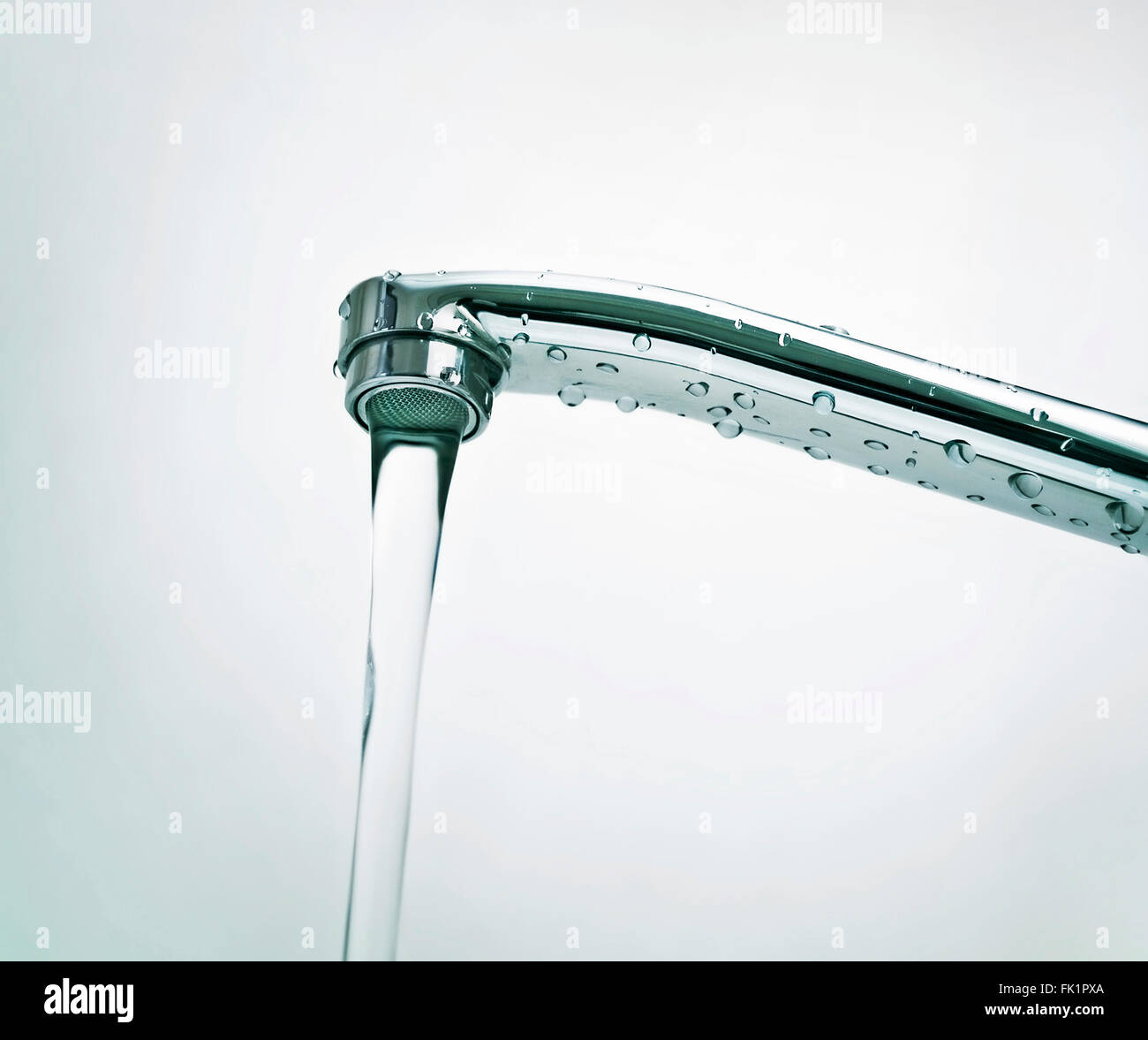 opened water tap Stock Photo - Alamy