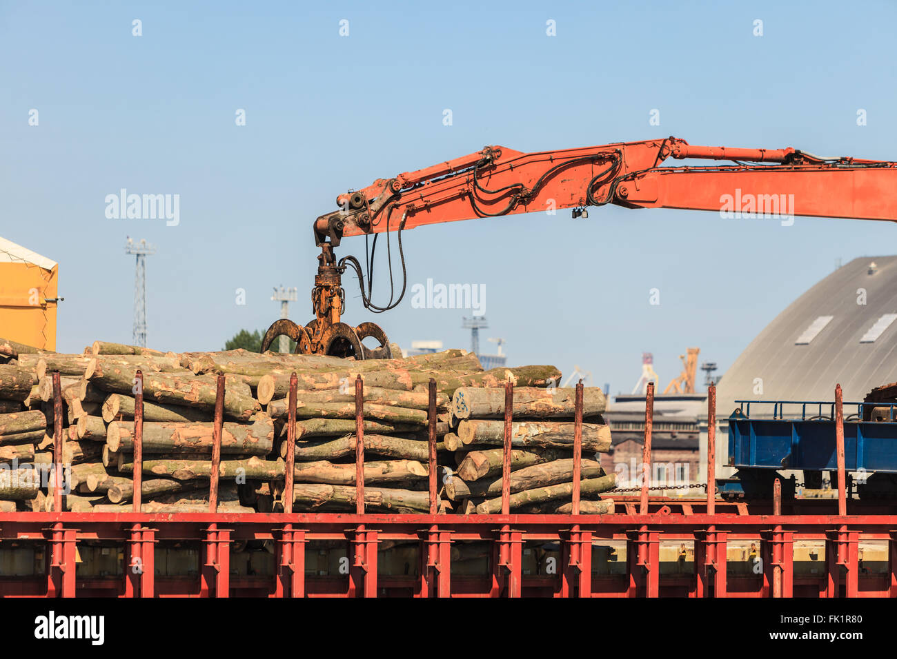 pile of logs at the port ready for loading to ships. Industry Stock ...