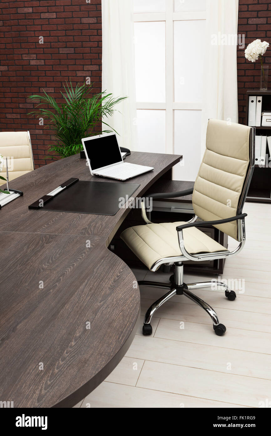 laptop on a desk in a modern office Stock Photo - Alamy
