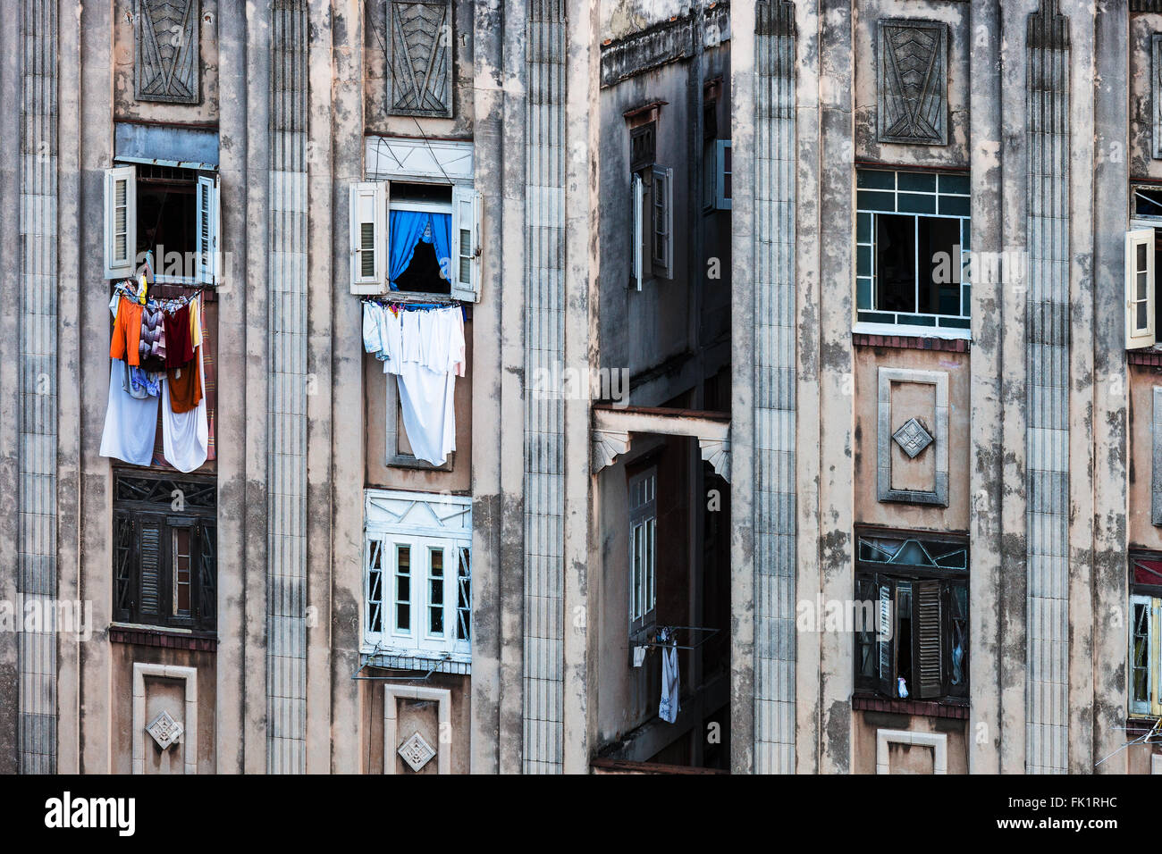 drying clothes in the windows of the old house Stock Photo - Alamy