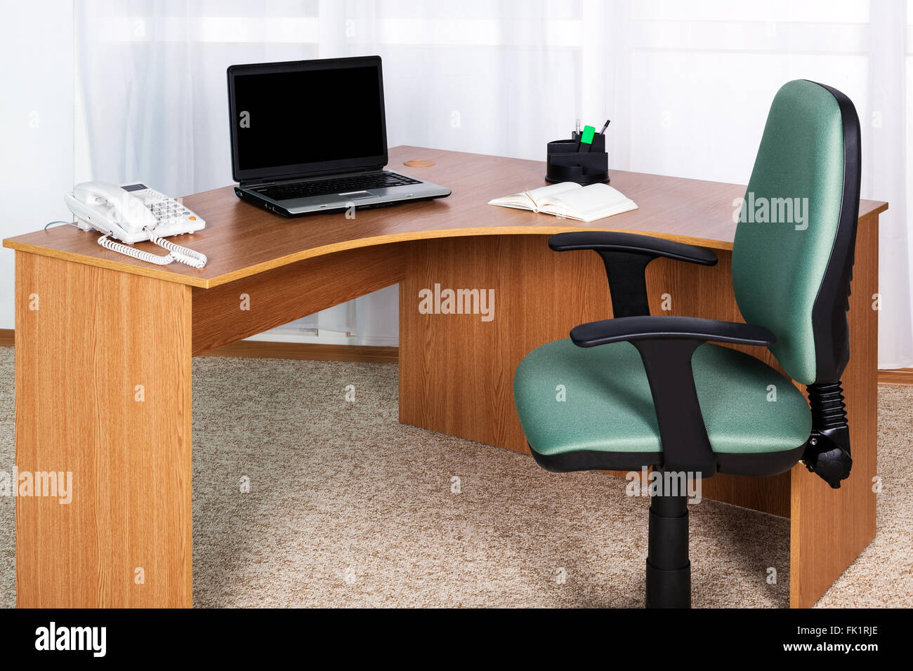 laptop on a desk in a modern office Stock Photo - Alamy